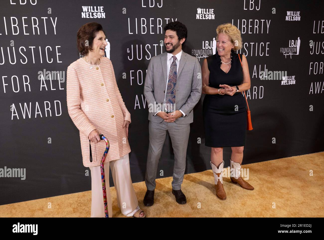 LBJ daughter LYNDA ROBB, l, poses with Congressman GREG CASAR and ...