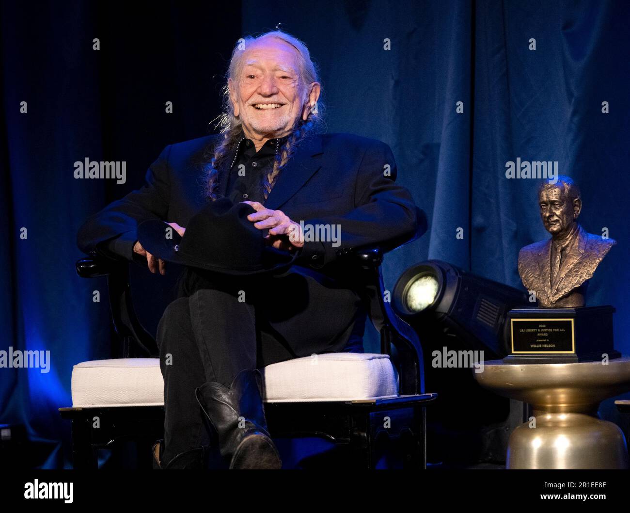 May 12, 2023: Singer WILLIE NELSON is all smiles sitting next to his ...