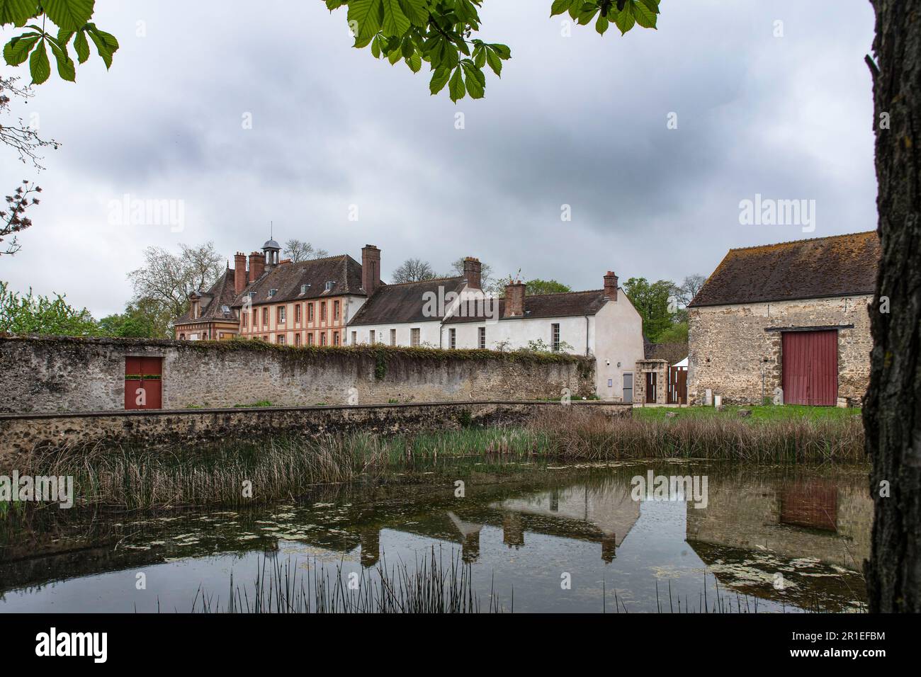 Architecture of old houses by a river in the Chevreuse valley in France ...