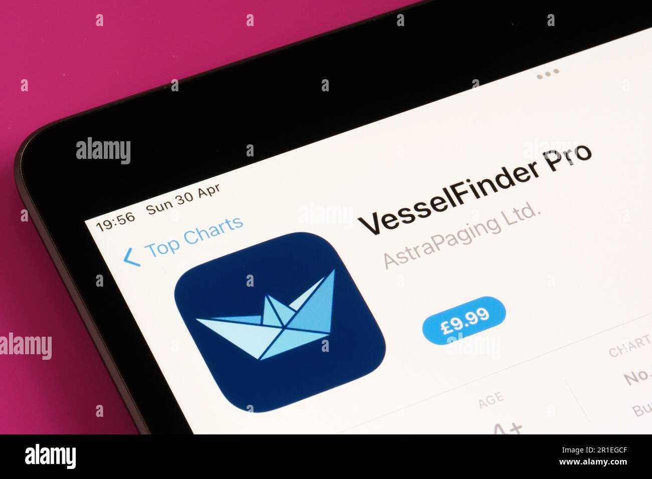 VesselFinder Pro app seen in App Store on the screen of ipad. Selective focus. Stafford, United ...