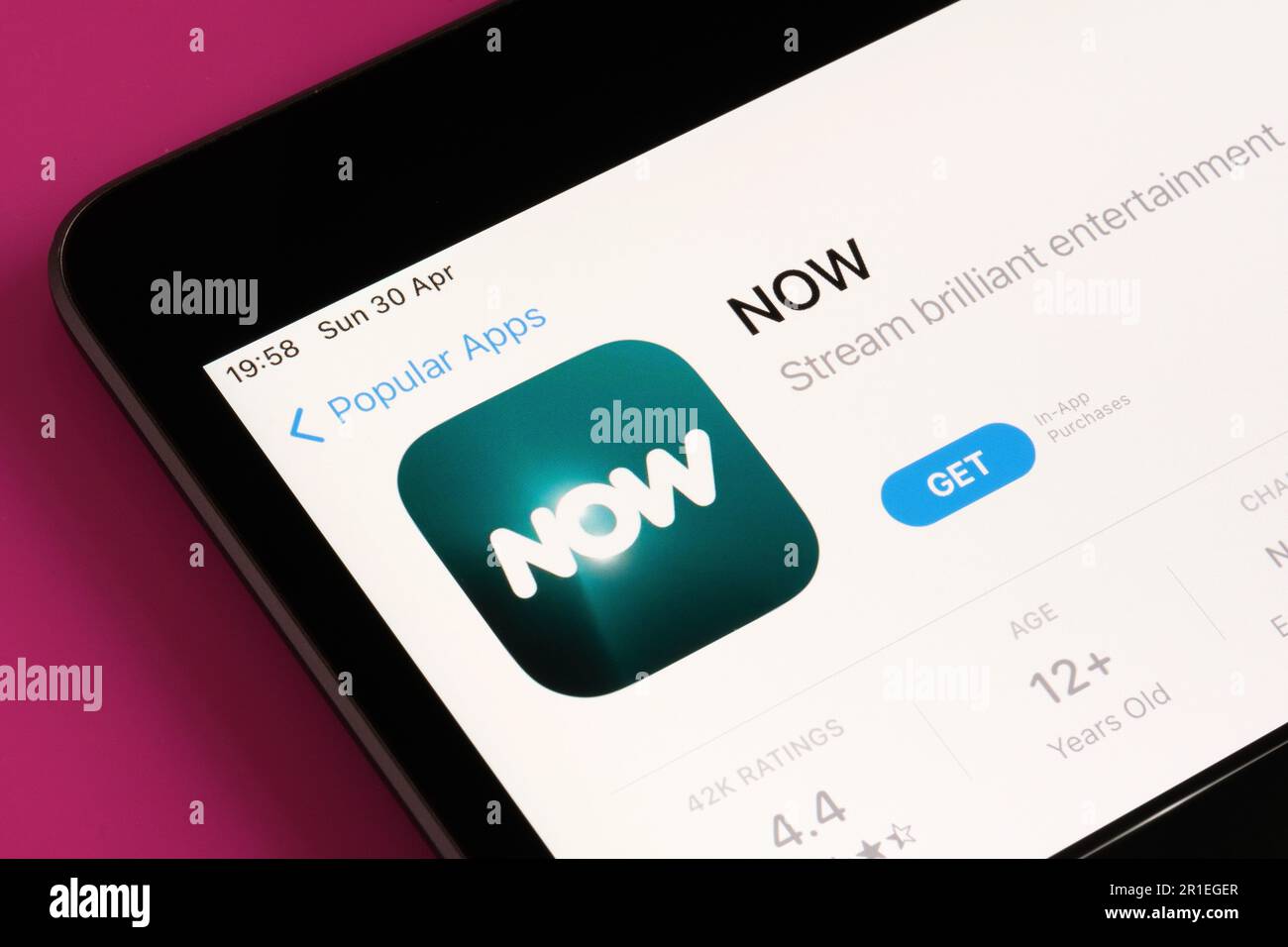 NOW streaming app seen in App Store on the screen of ipad. Selective ...