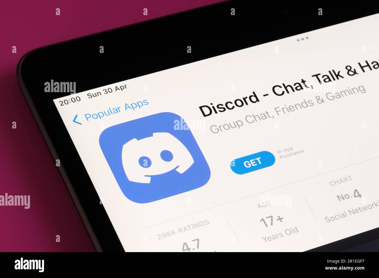 discord app seen in App Store on the screen of ipad. Selective focus ...