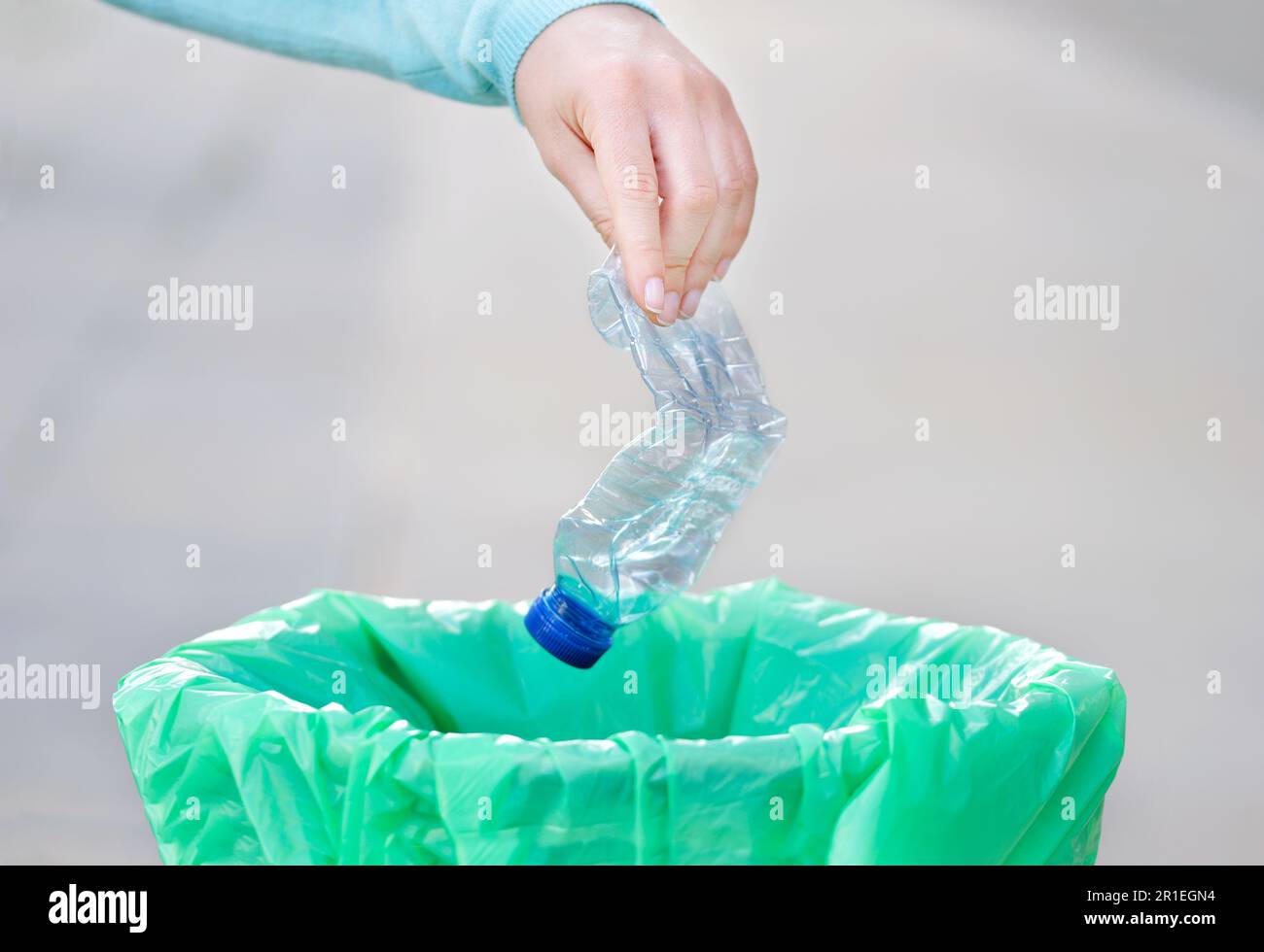Woman throwing garbage hi-res stock photography and images - Alamy