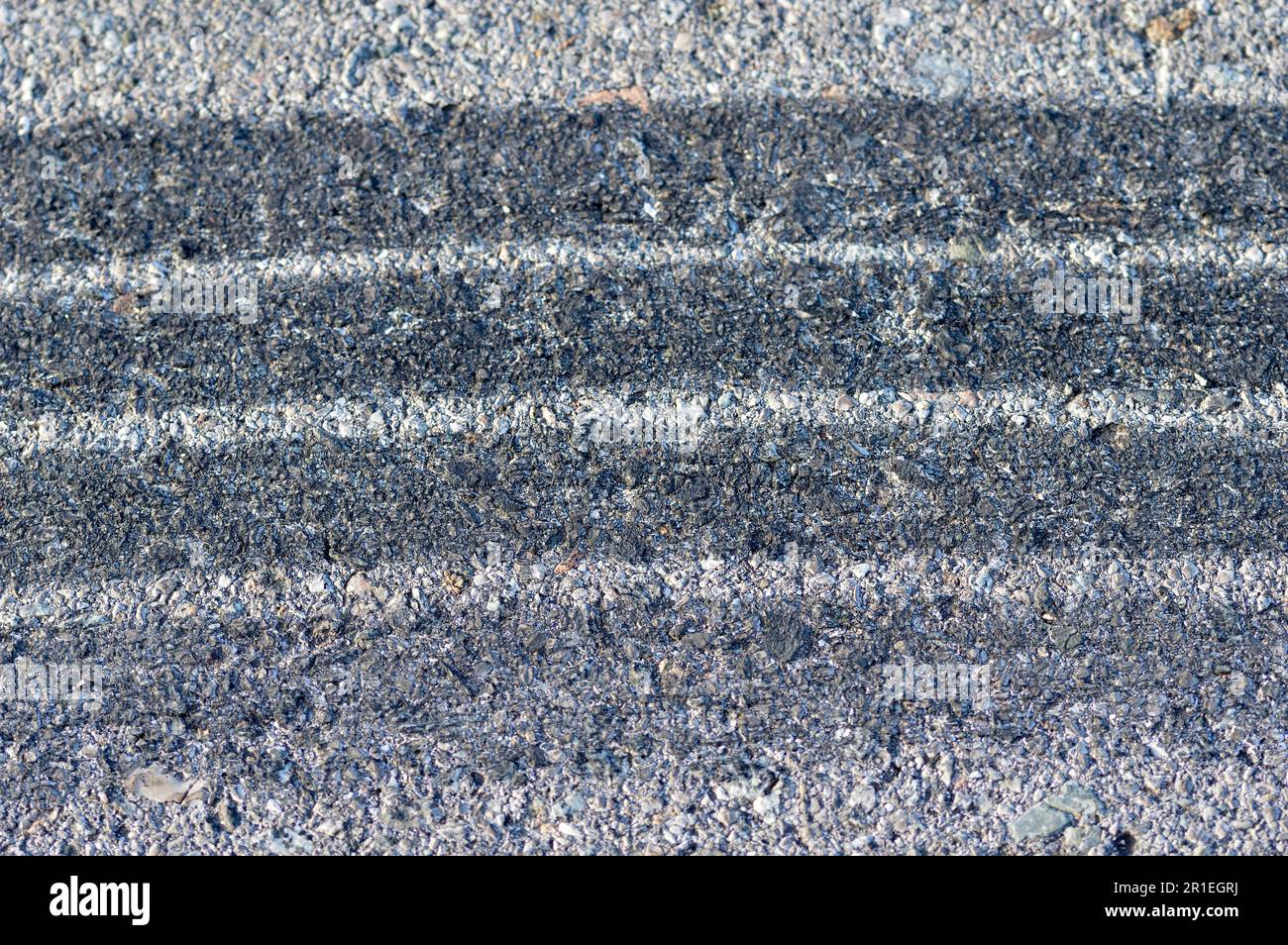 Close-up of several tire skid marks on asphalt Stock Photo - Alamy