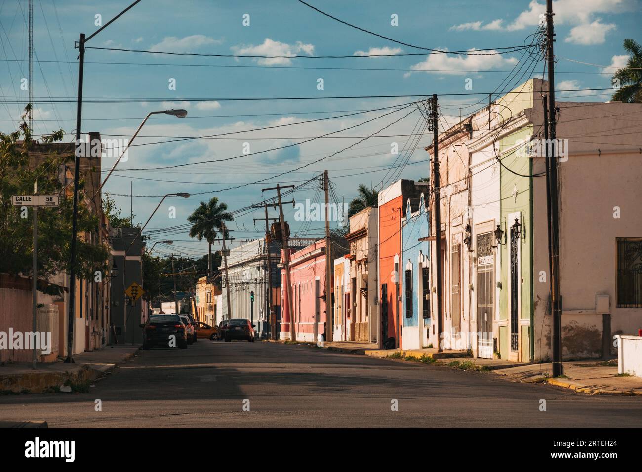 a row of colonial buildings painted in vibrant colors in Campeche ...