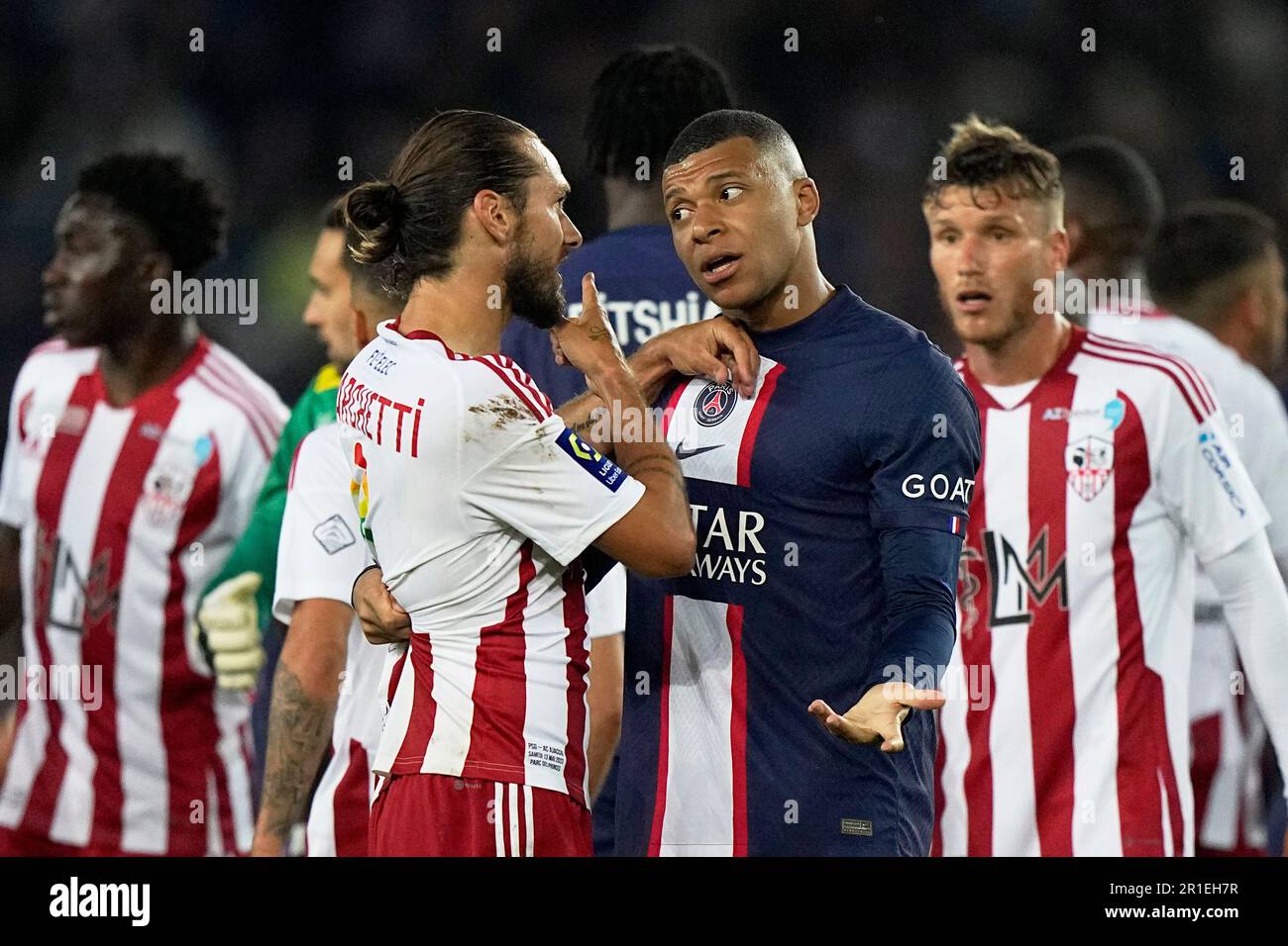 PSG's Kylian Mbappe, center right, and Ajaccio's Vincent Marchetti ...