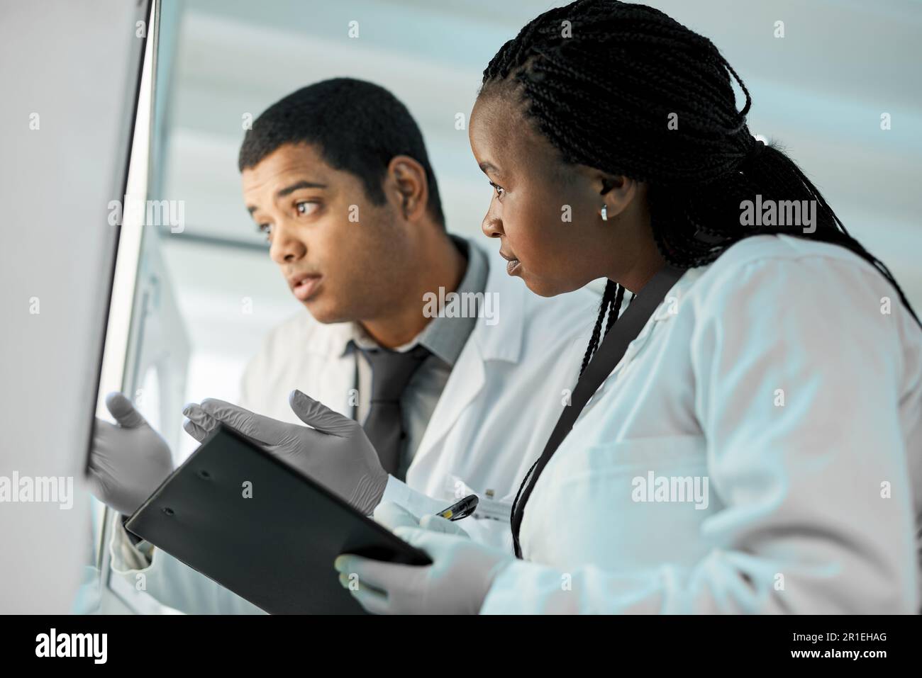 Scientists working inside modern laboratory hi-res stock photography ...