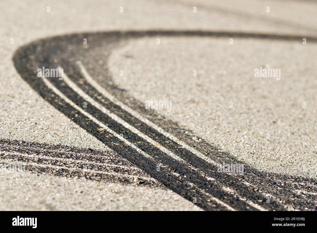 Close-up of several tire skid marks on asphalt Stock Photo - Alamy