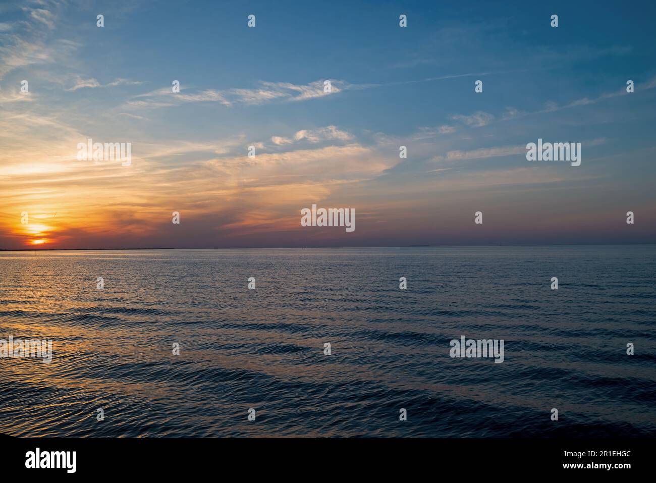 Lake Erie with shoreline at sunset. It is the fourth largest lake of ...