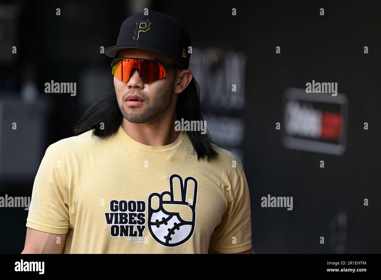 Pittsburgh Pirates' Connor Joe walks through the dugout before playing ...