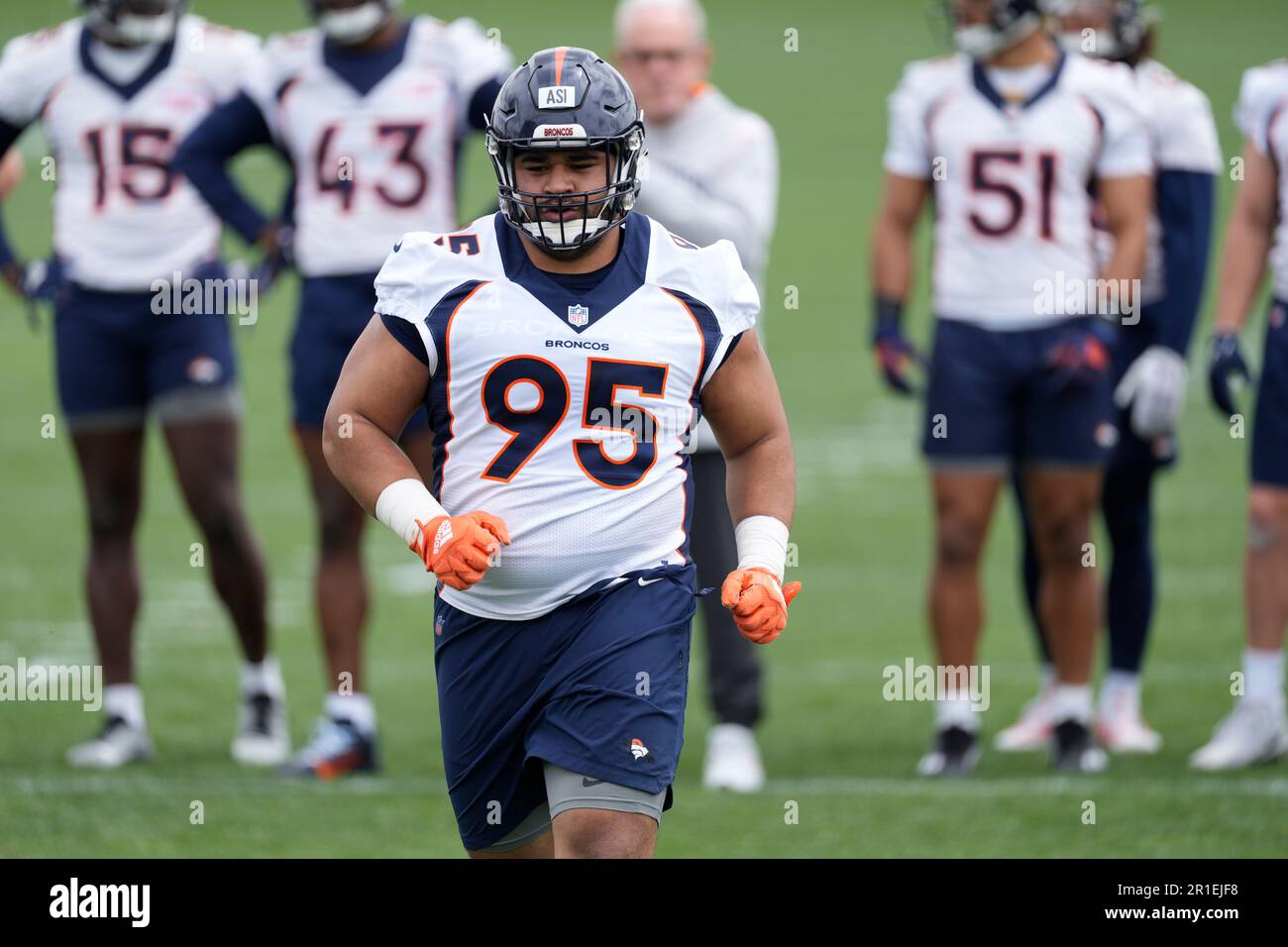 Denver Broncos defensive tackle Sione Asi takes part in drills during ...