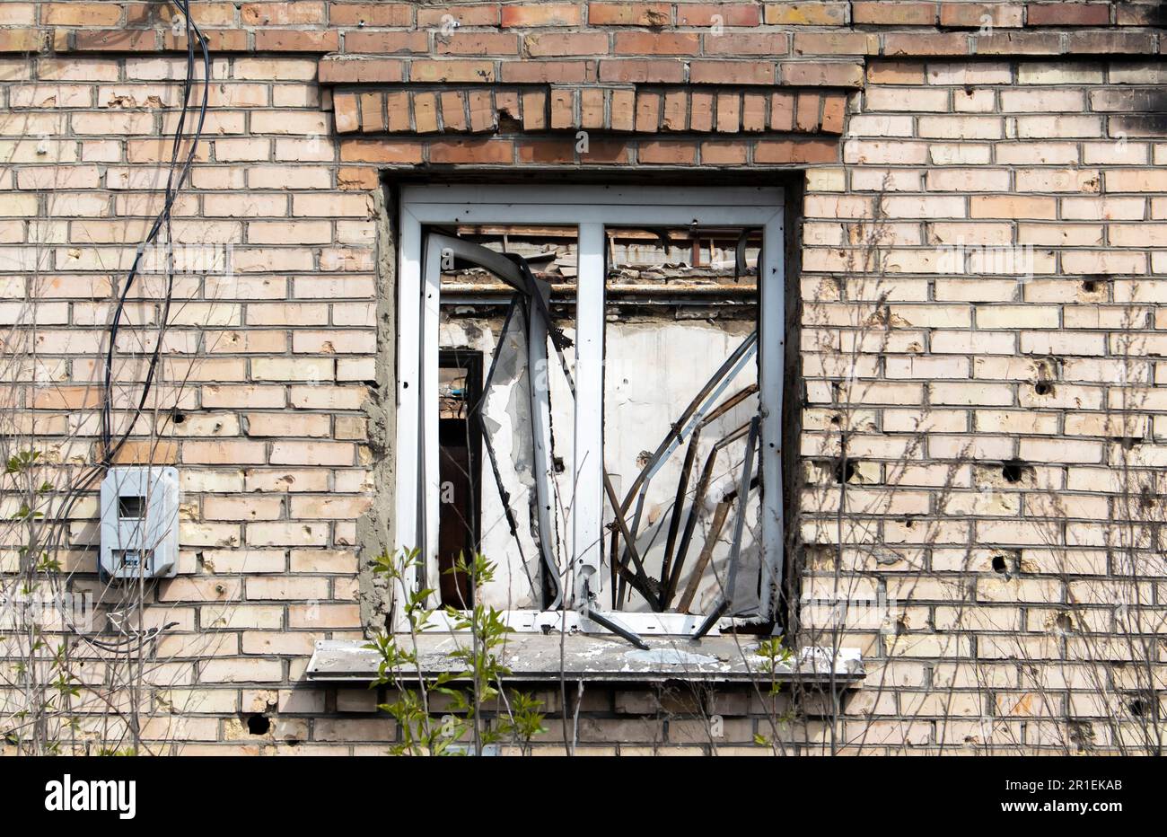 Destroyed and damaged window in the building as a result of the war ...