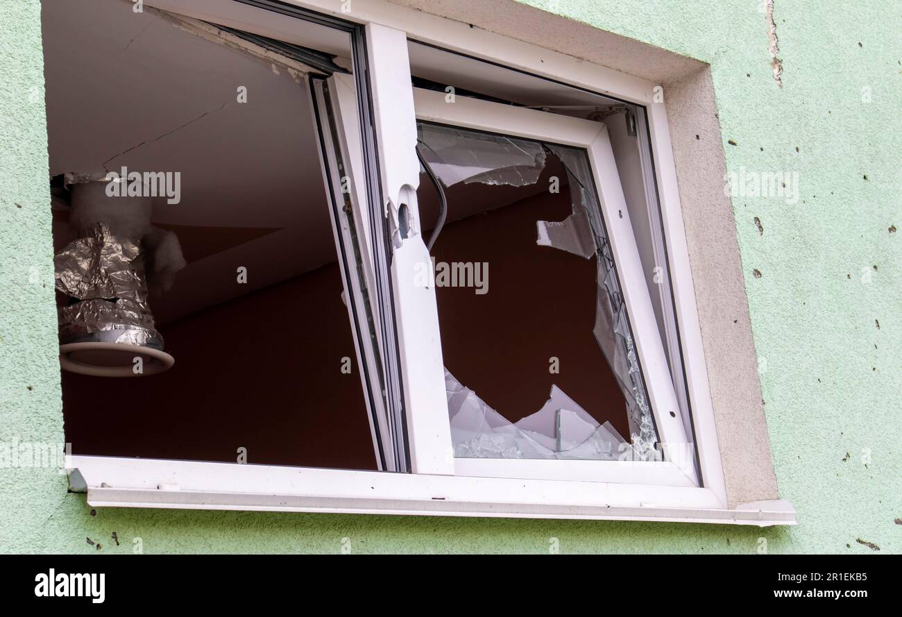 Destroyed and damaged window in the building as a result of the war ...