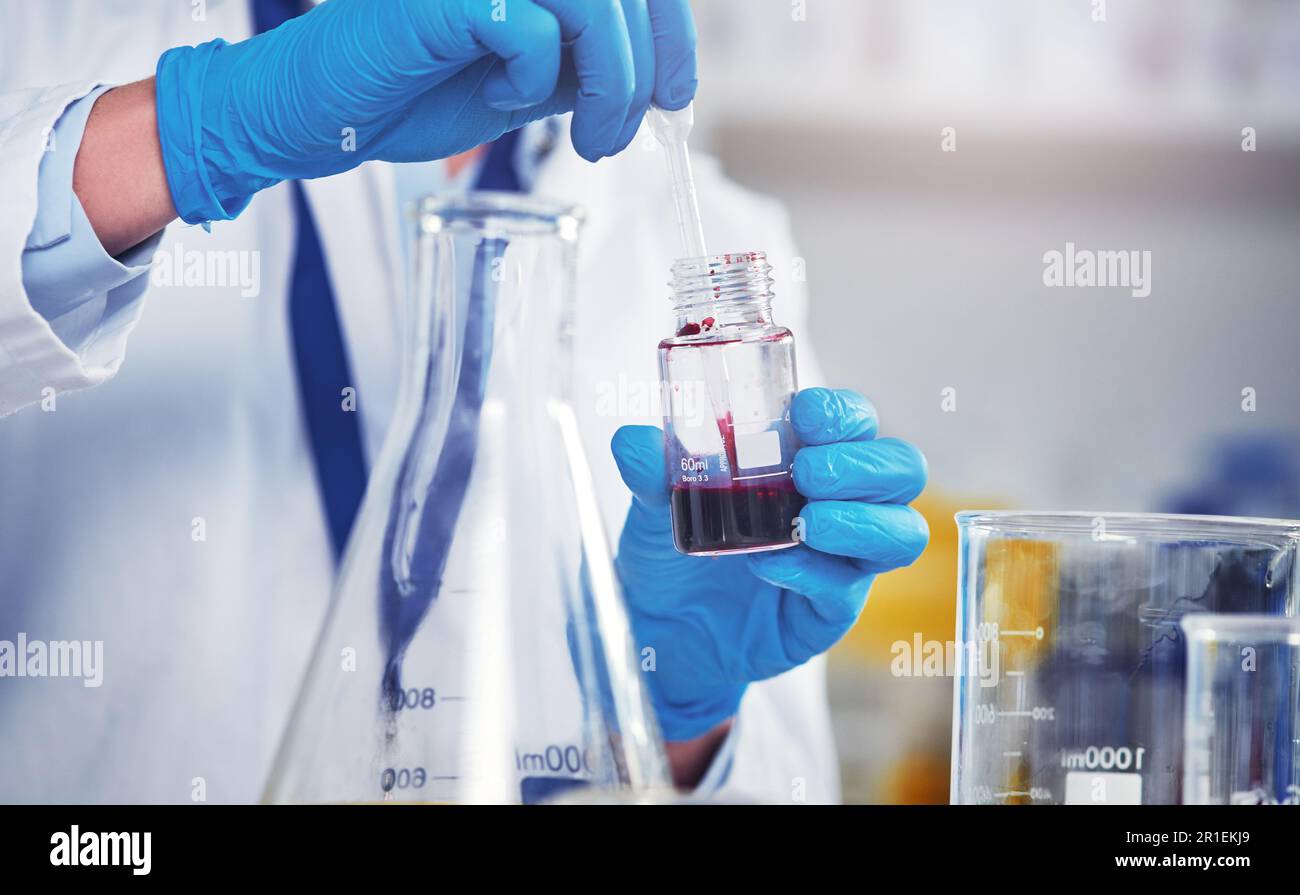 Now for the moment of truth. Closeup of an unrecognizable scientist ...