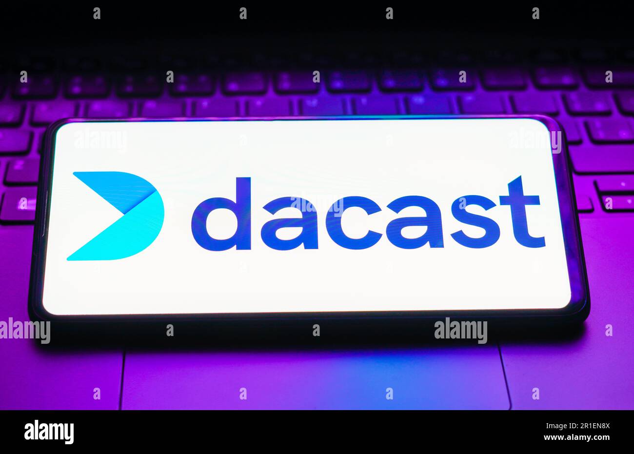 In this photo illustration, the Dacast logo is displayed on a ...