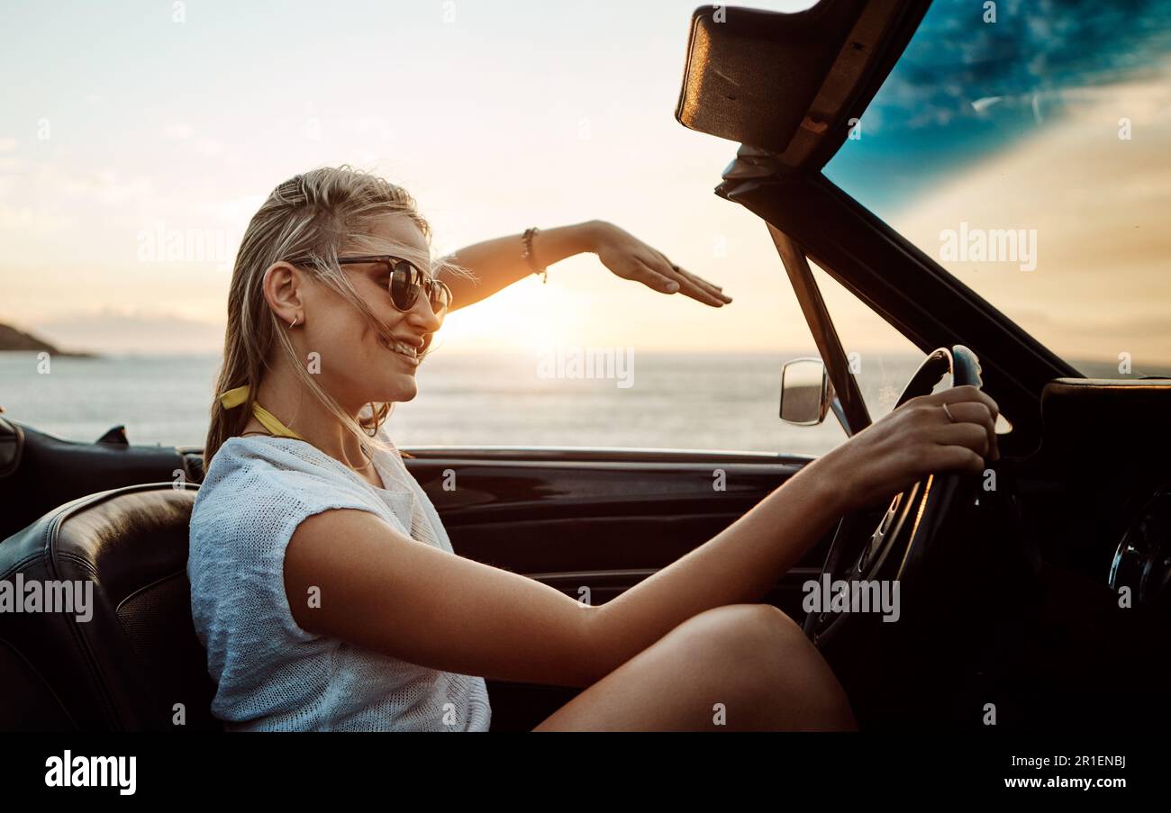 Woman car alone happy drive view hi-res stock photography and images ...