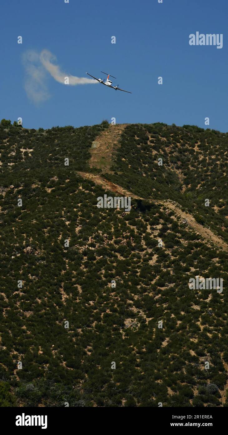 A U.S. Forest Service lead plane guides a MAFFS (Modular Airborne Fire ...