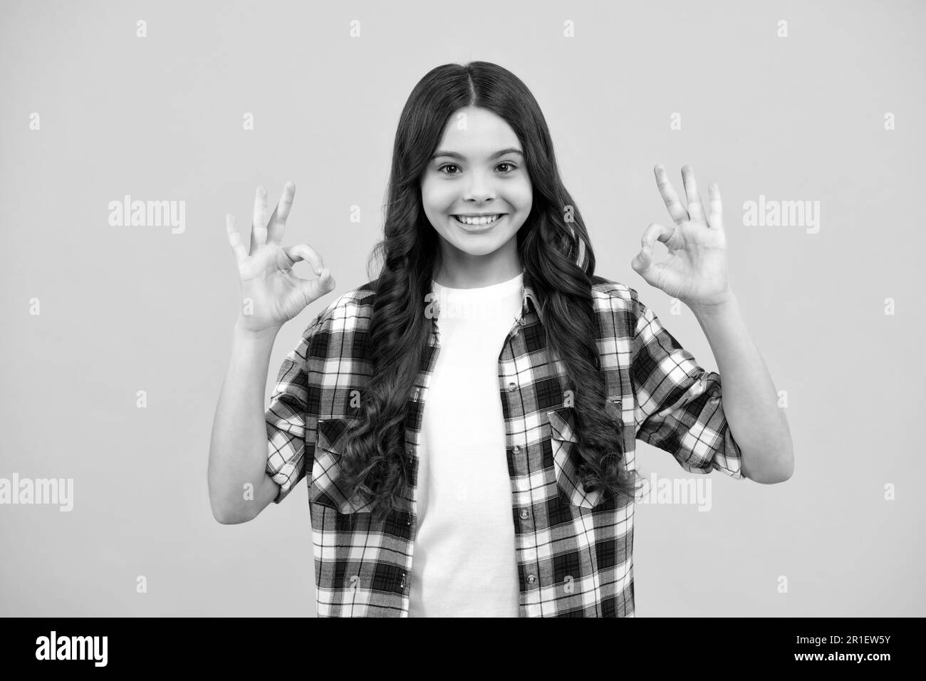 Emotional portrait of caucasian teen girl. Funny teenager making ok ...