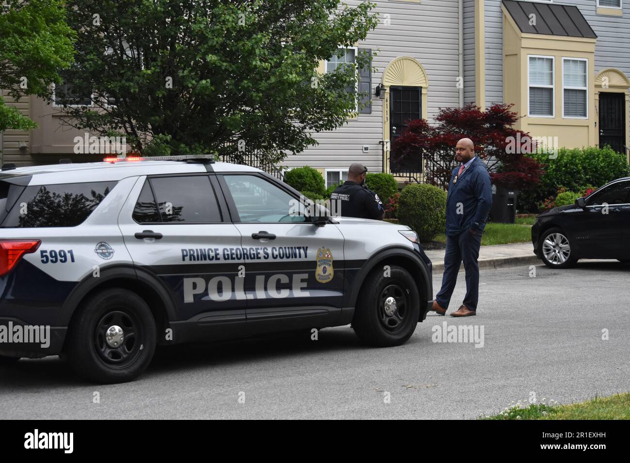 Prince George's County Police Department Officers converse with each ...