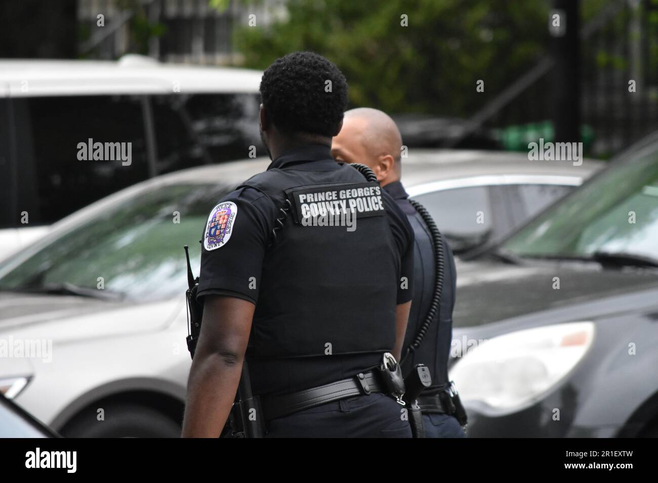 Prince George's County Police Department Officers converse with each ...