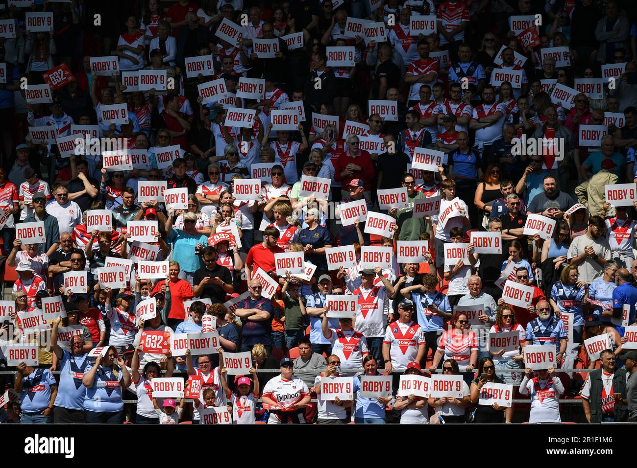 St. Helens, England - 13th May 2023 - St. Helens fans hold up Roby 9 ...
