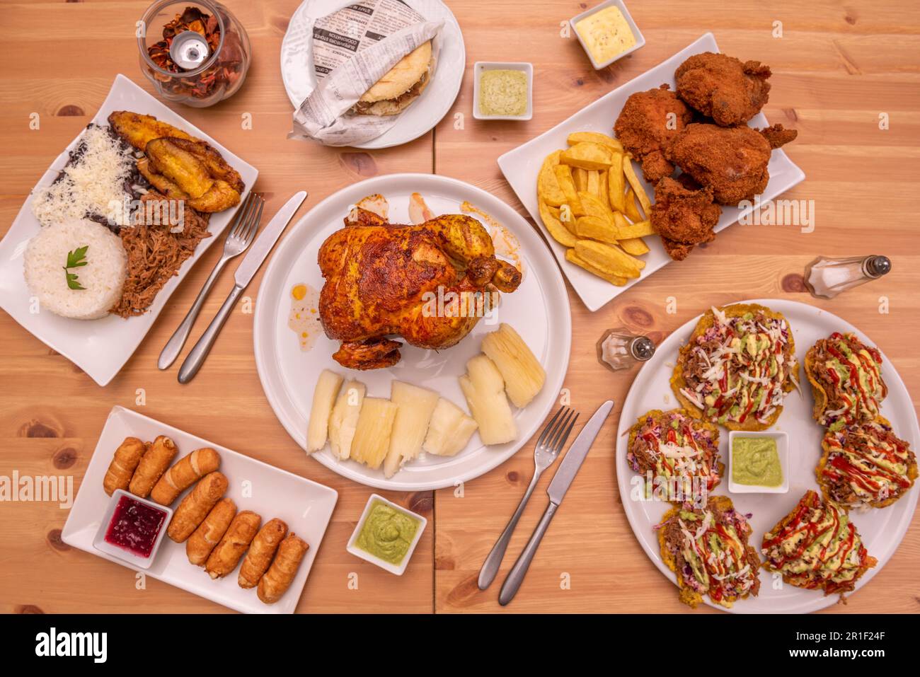 Latino cuisine dishes set with roasted chicken, broster chicken ...