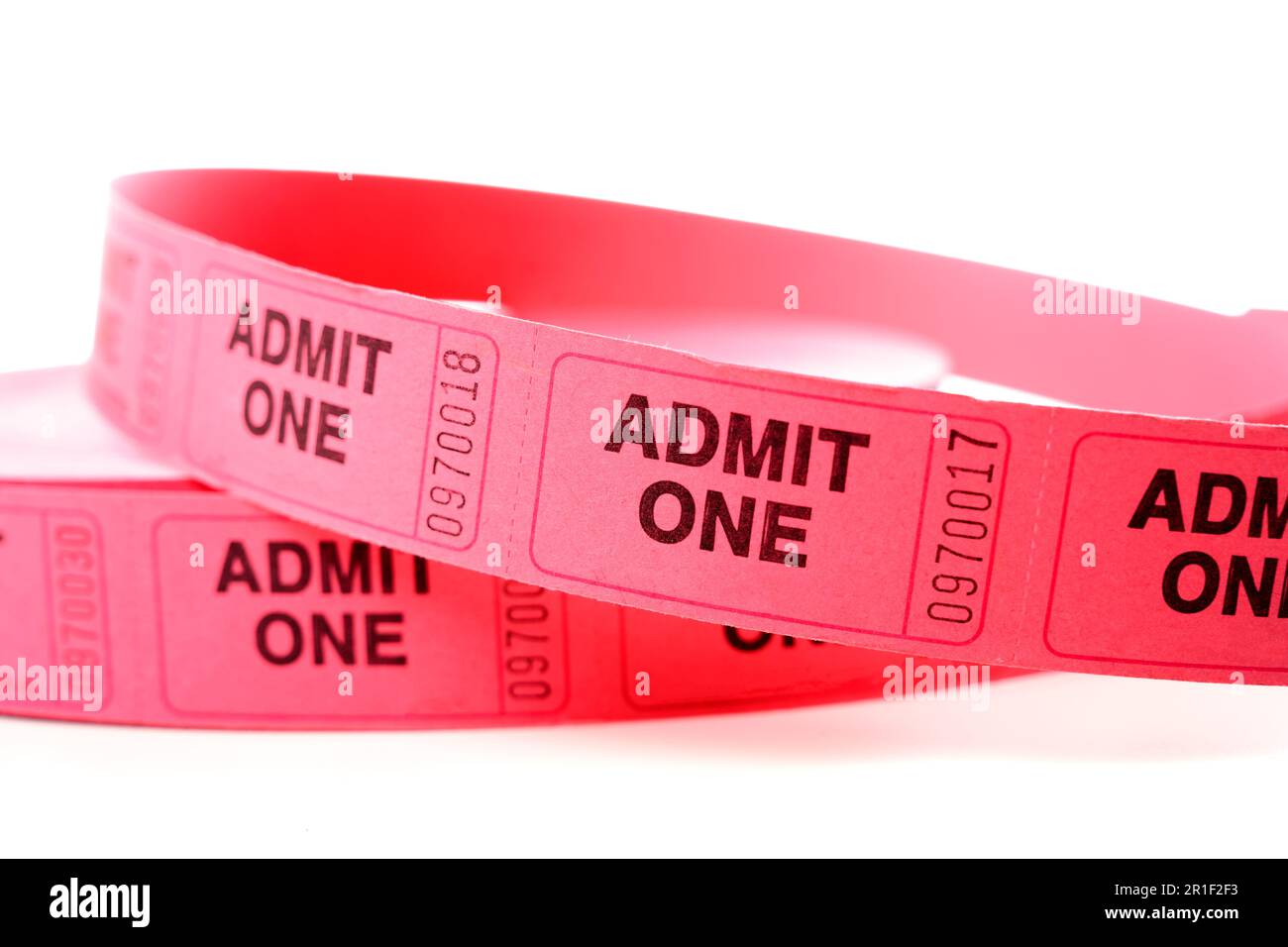 Pink Admit One tickets on white background Stock Photo - Alamy