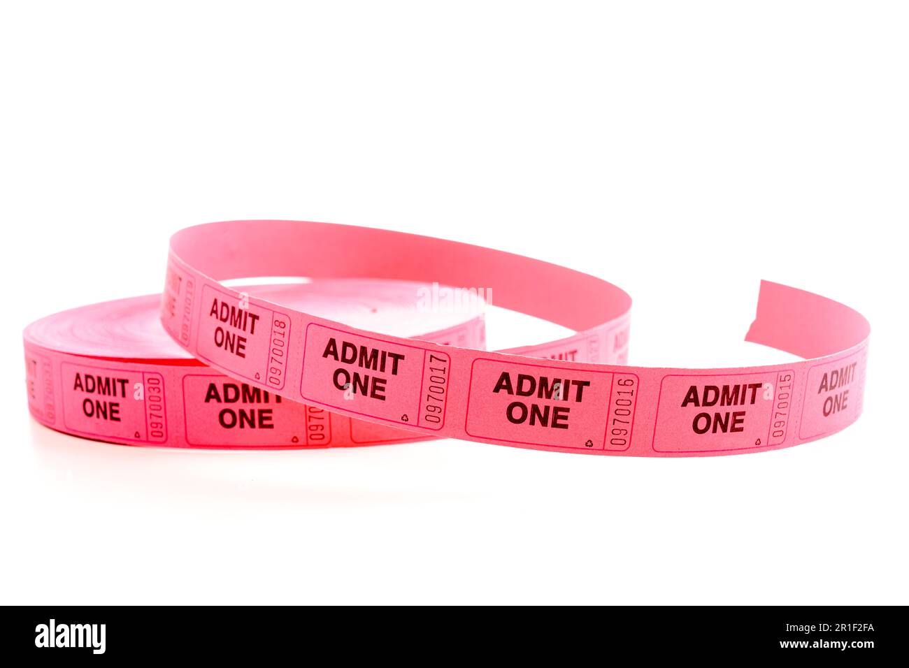 Pink Admit One tickets on white background Stock Photo - Alamy