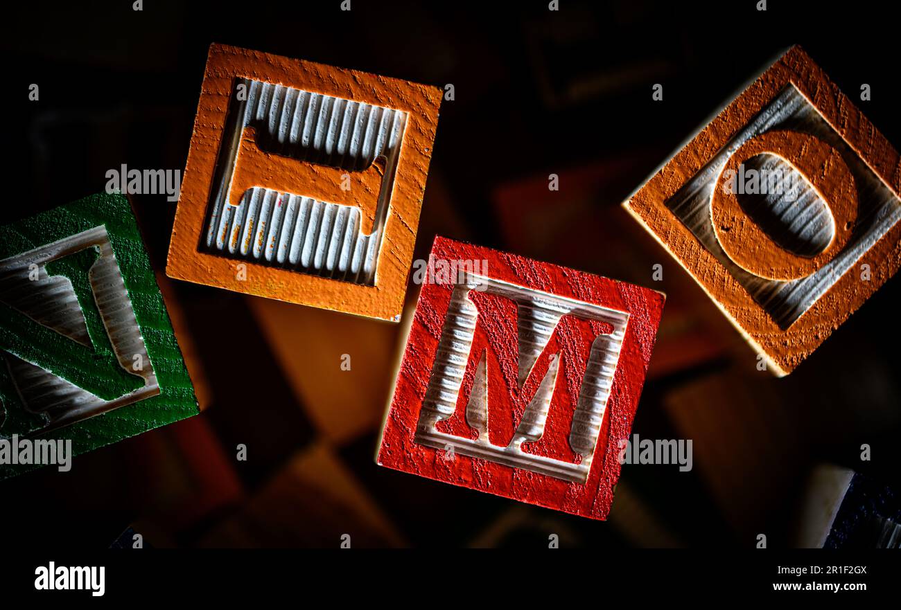 A colorful group of children's, wooden letter blocks Stock Photo - Alamy