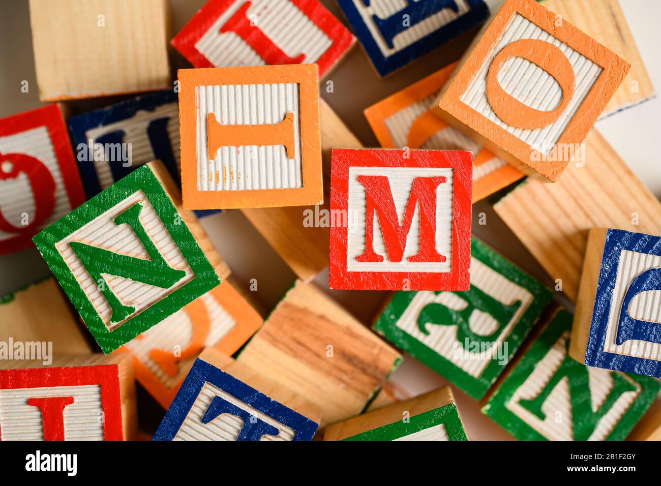 A colorful group of children's, wooden letter blocks Stock Photo - Alamy