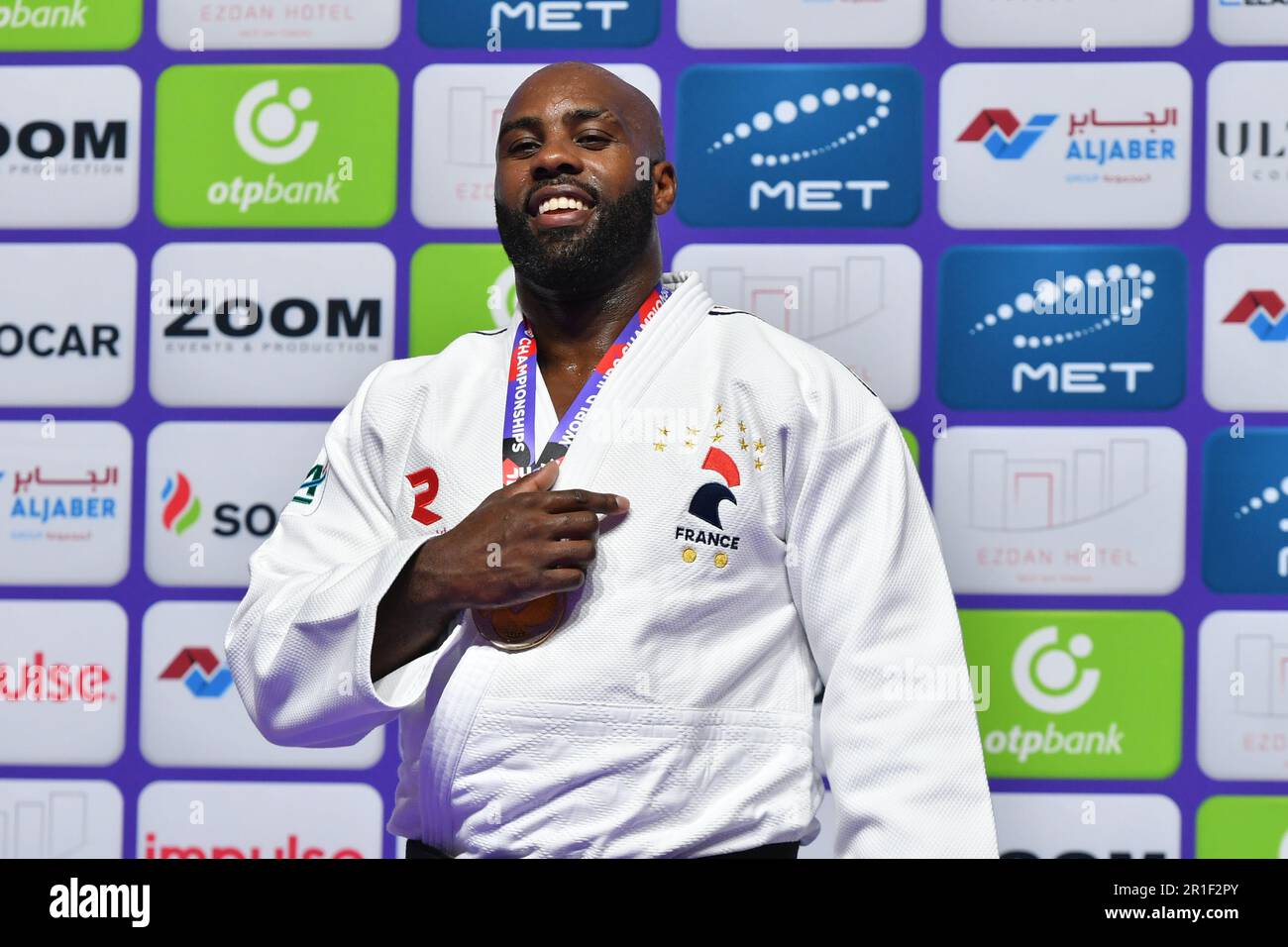 France's Teddy Riner poses with the gold medal after winning the men's ...