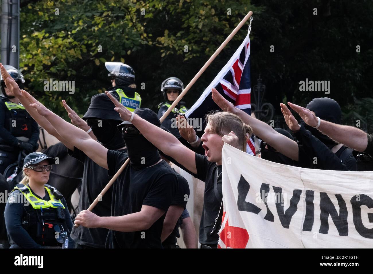 Melbourne, Australia, 13 May, 2023. Neo-Nazis salute during a heated political rally against ...
