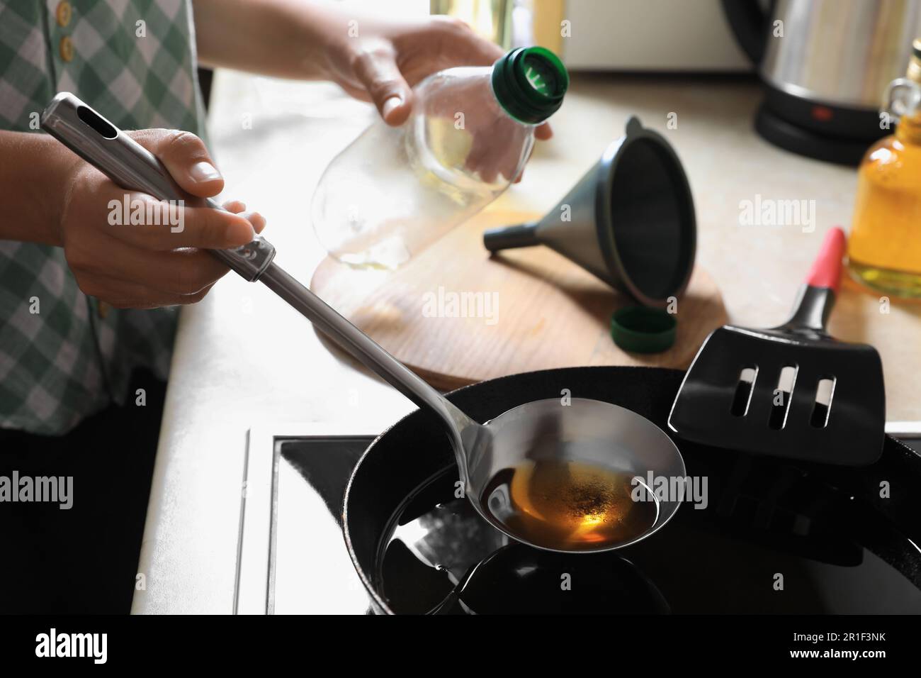 Woman used cooking oil hi-res stock photography and images - Alamy