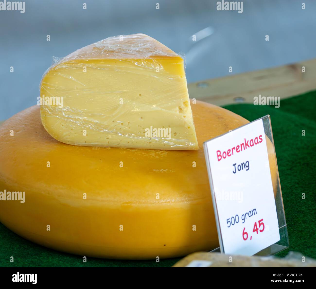Tasting of different cheeses in Dutch cheese farm shop, English ...
