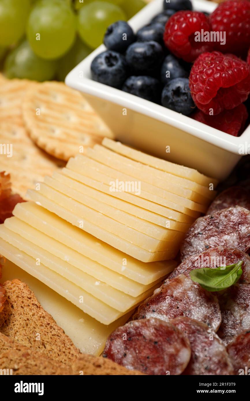 Snack set with delicious Parmesan cheese, closeup Stock Photo - Alamy