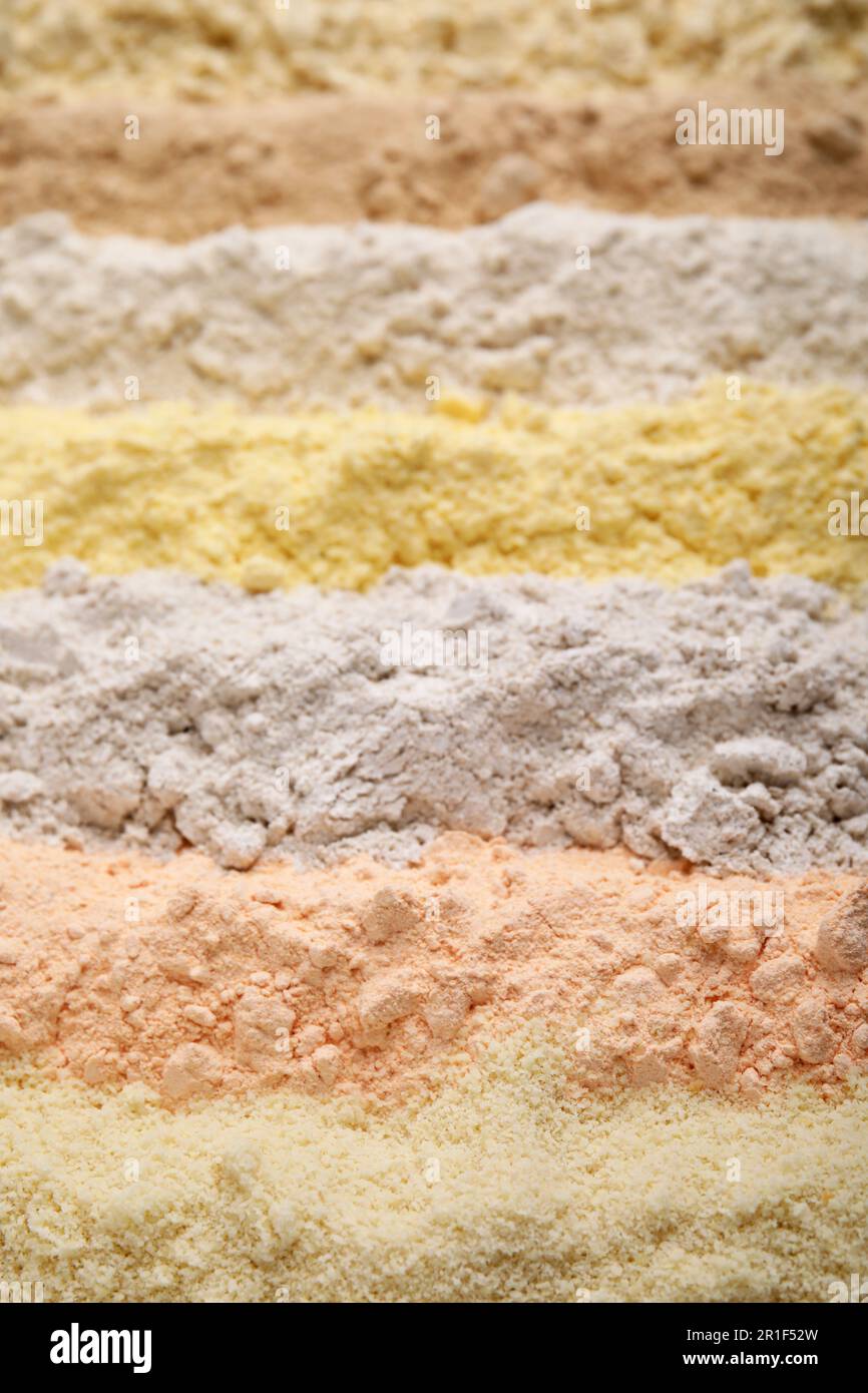 Different types of flours as background, closeup Stock Photo - Alamy