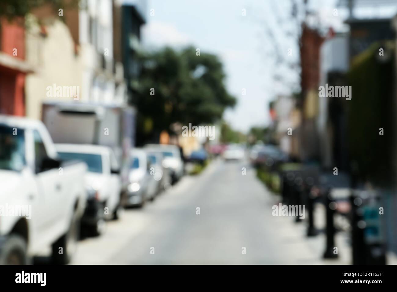 Blurred view of city street with cars Stock Photo - Alamy