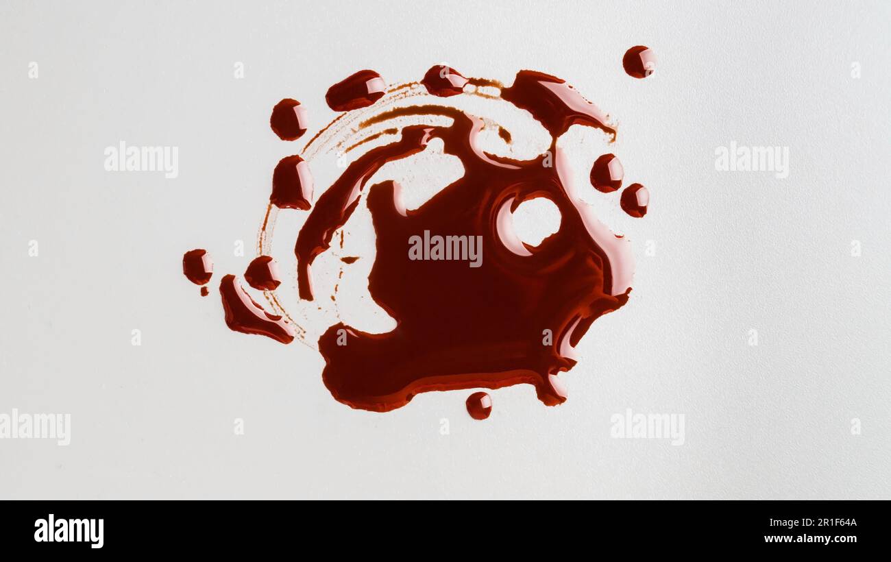 Stain of blood on grey background, top view Stock Photo - Alamy