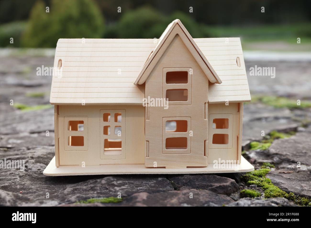 House model on stone road with cracks. Earthquake disaster Stock Photo ...