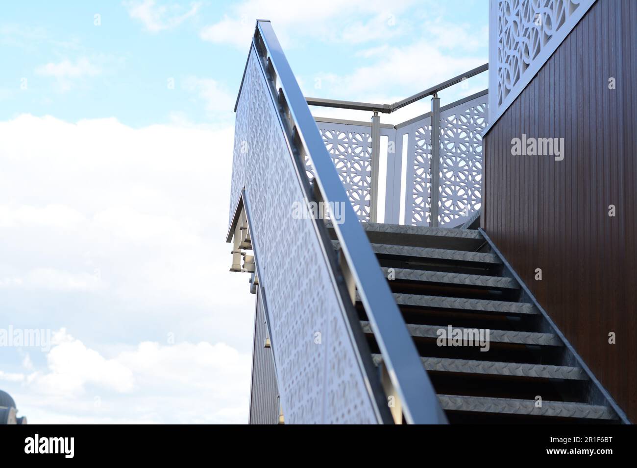 View of metal outdoor stairs with railing Stock Photo - Alamy