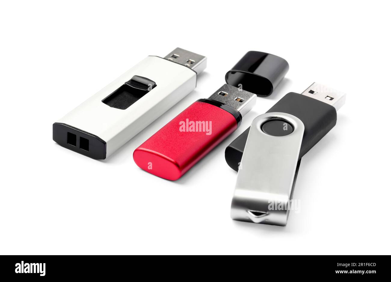 Different usb flash drives on white background Stock Photo - Alamy