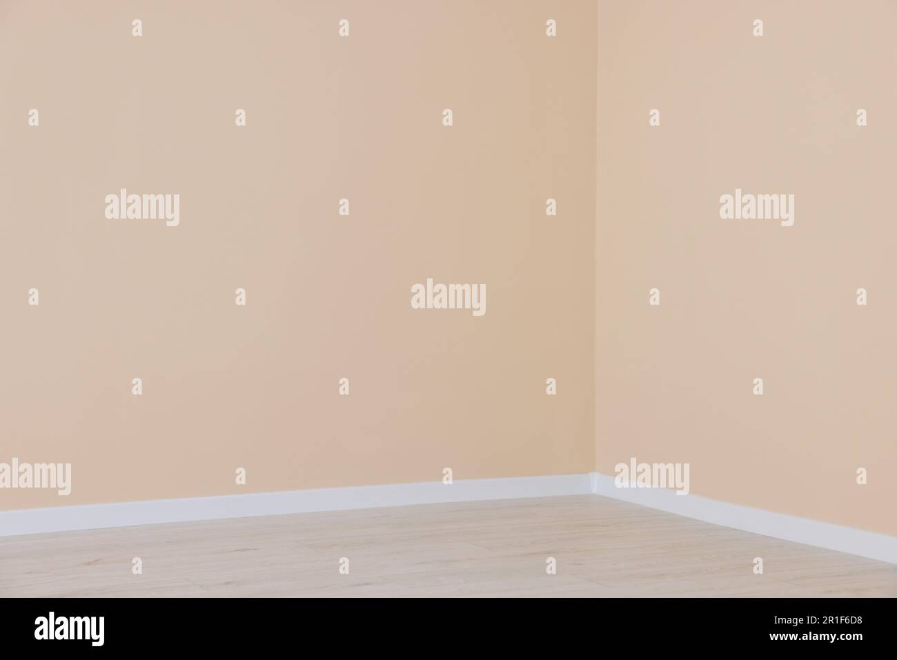 Beautiful beige walls in clean empty room Stock Photo - Alamy