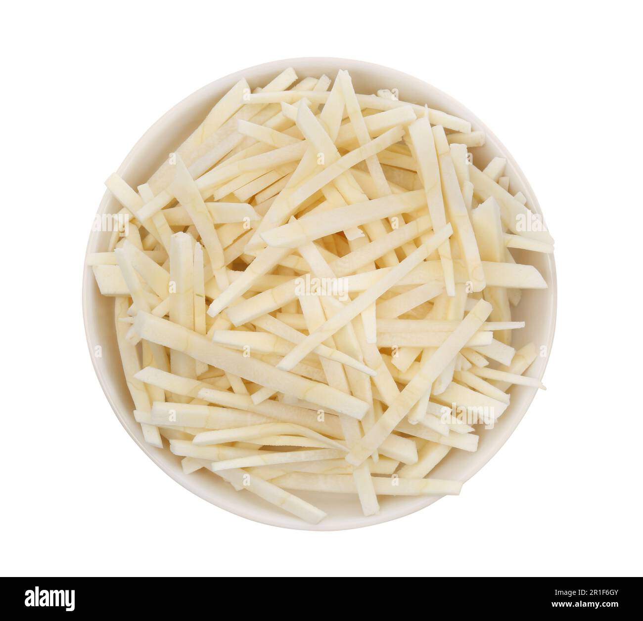 Plate with cut fresh parsnip on white background, top view Stock Photo ...
