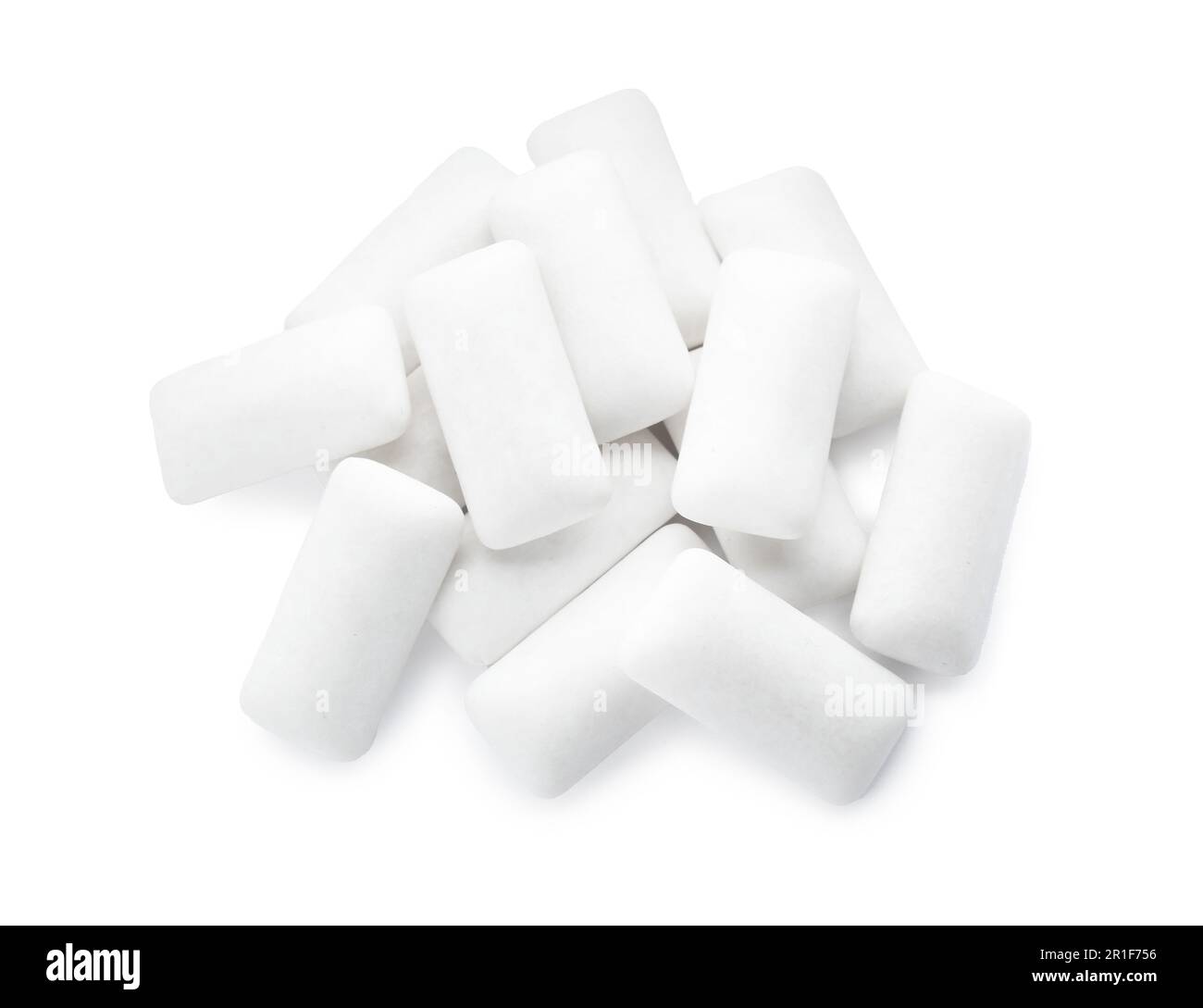 Heap of chewing gum pieces on white background, top view Stock Photo ...