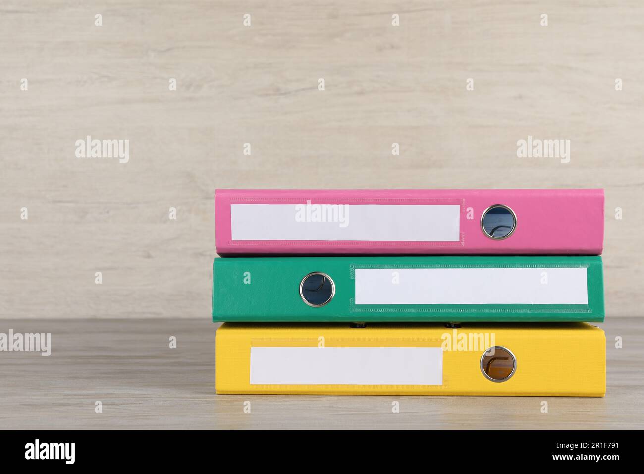 Stack of office folders on white wooden table Stock Photo - Alamy