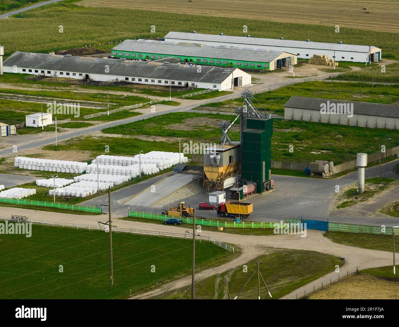Countryside farming surrounded by planted fields with crops Stock Photo ...