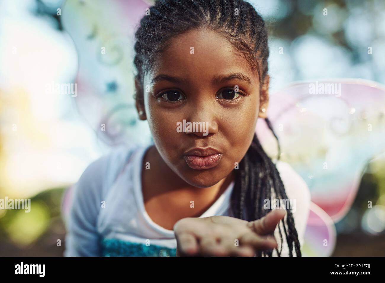 Kiss, princess costume and portrait of girl in forest for playing ...