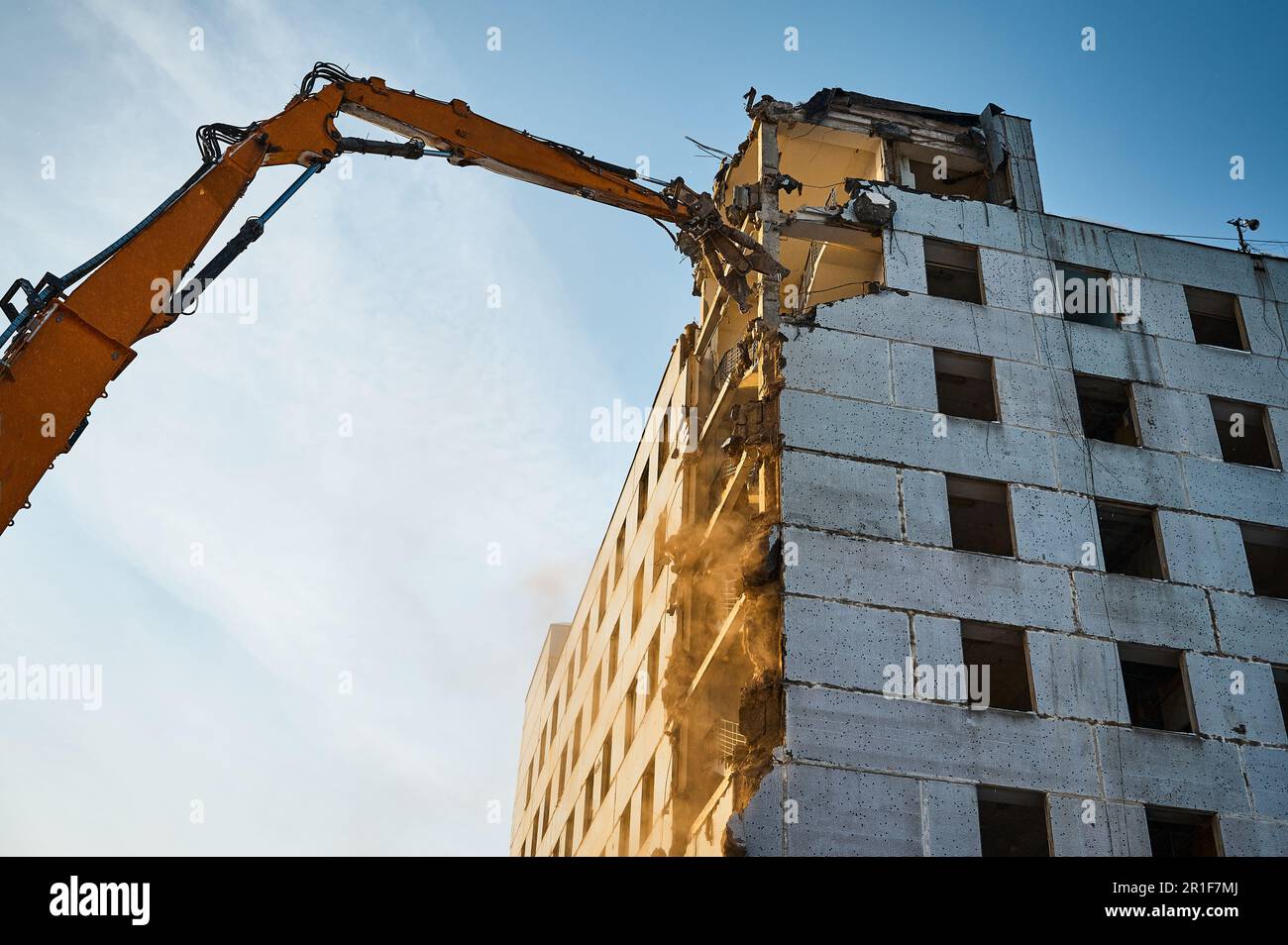 Demolition of residential building with crawler excavator Stock Photo ...