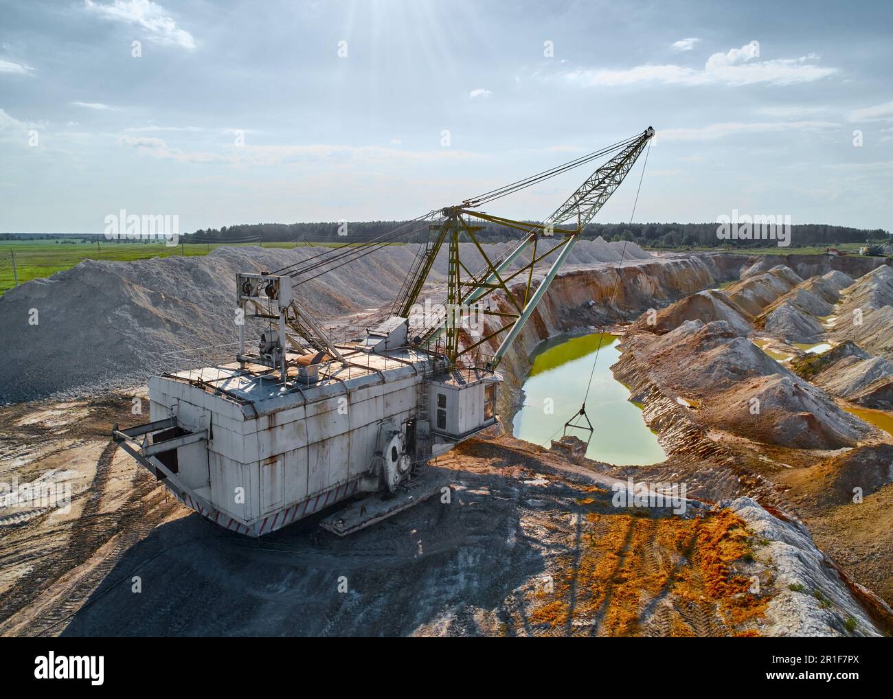 Old walking dragline with bucket operates in chalkquarry Stock Photo ...