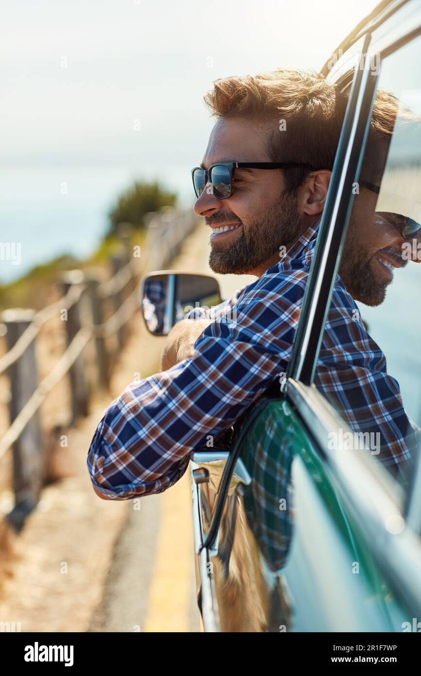 Road trip, travel and man with smile in car driving for adventure ...